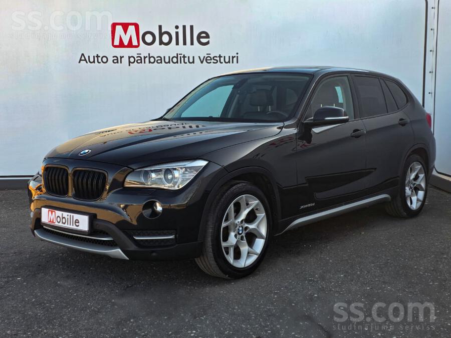 Black BMW X1 2014 in Riga, with an engine capacity of 2.00 L and mileage of 269 thousand km for 10700 €, photo 4 on AUTOMOTO.COM.LV