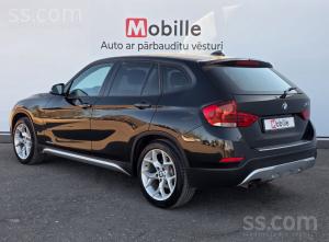 Black BMW X1 2014 in Riga, with an engine capacity of 2.00 L and mileage of 269 thousand km for 10700 €, photo 5 on AUTOMOTO.COM.LV