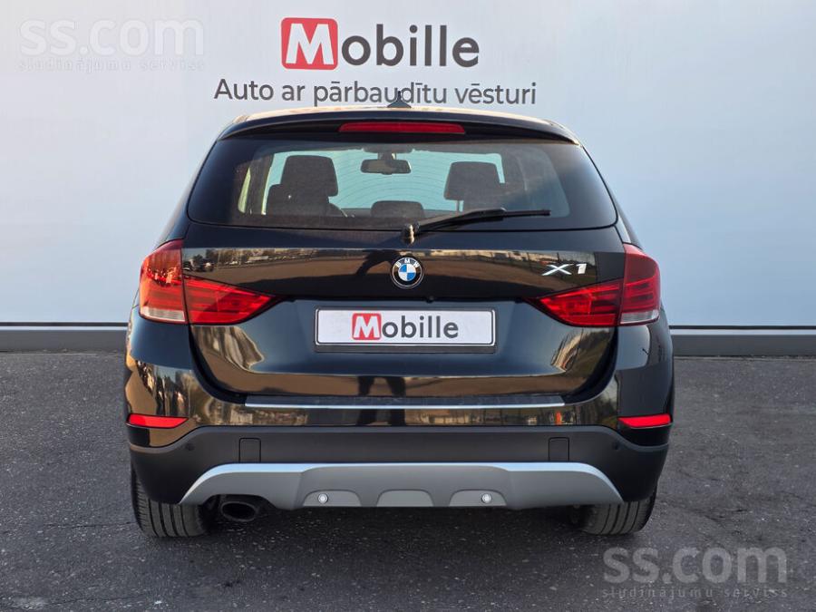 Black BMW X1 2014 in Riga, with an engine capacity of 2.00 L and mileage of 269 thousand km for 10700 €, photo 6 on AUTOMOTO.COM.LV