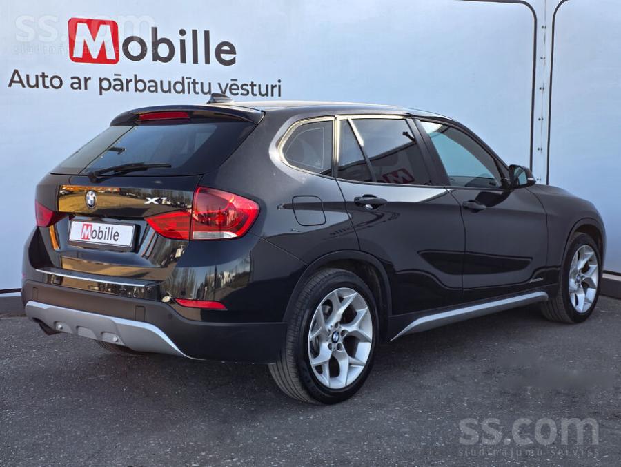 Black BMW X1 2014 in Riga, with an engine capacity of 2.00 L and mileage of 269 thousand km for 10700 €, photo 7 on AUTOMOTO.COM.LV