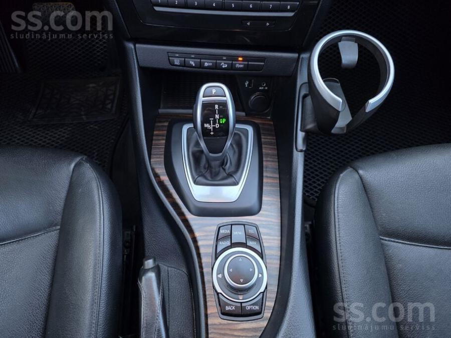 Black BMW X1 2014 in Riga, with an engine capacity of 2.00 L and mileage of 269 thousand km for 10700 €, photo 10 on AUTOMOTO.COM.LV