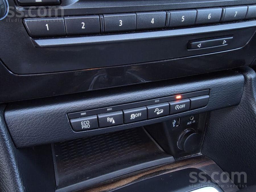 Black BMW X1 2014 in Riga, with an engine capacity of 2.00 L and mileage of 269 thousand km for 10700 €, photo 15 on AUTOMOTO.COM.LV