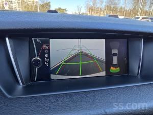 Black BMW X1 2014 in Riga, with an engine capacity of 2.00 L and mileage of 269 thousand km for 10700 €, photo 17 on AUTOMOTO.COM.LV