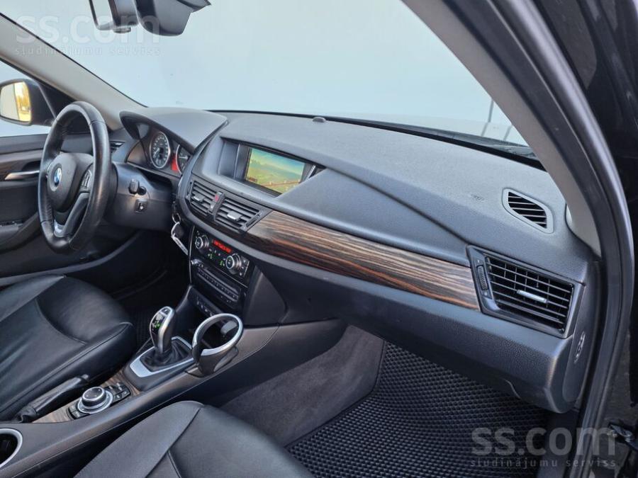 Black BMW X1 2014 in Riga, with an engine capacity of 2.00 L and mileage of 269 thousand km for 10700 €, photo 18 on AUTOMOTO.COM.LV