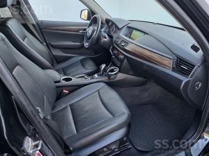 Black BMW X1 2014 in Riga, with an engine capacity of 2.00 L and mileage of 269 thousand km for 10700 €, photo 19 on AUTOMOTO.COM.LV