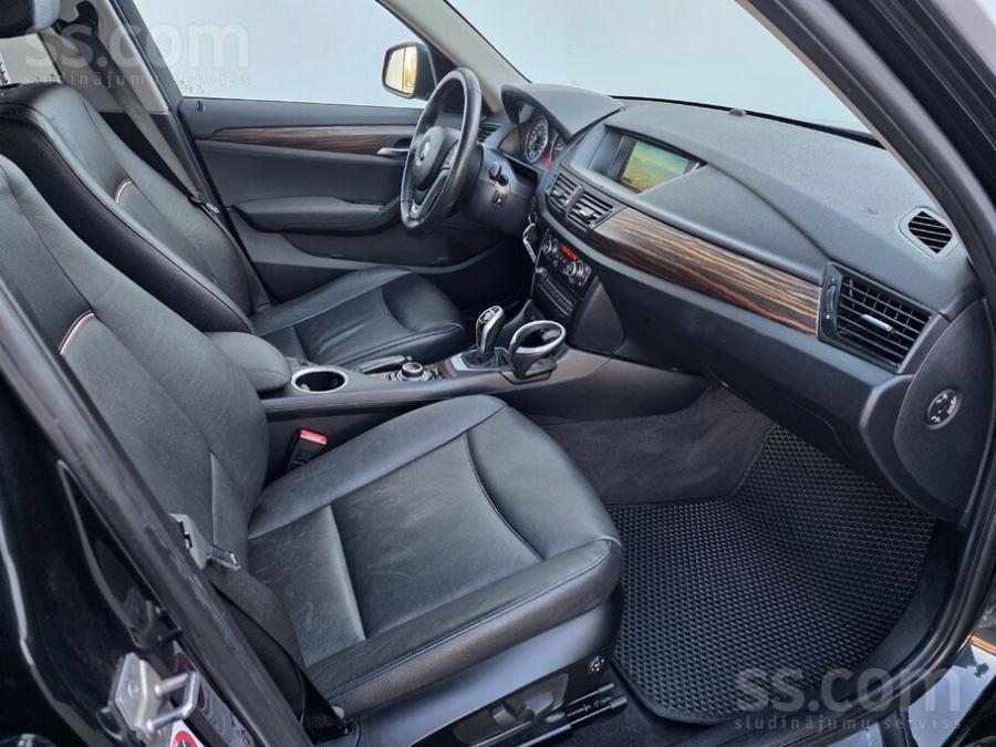 Black BMW X1 2014 in Riga, with an engine capacity of 2.00 L and mileage of 269 thousand km for 10700 €, photo 19 on AUTOMOTO.COM.LV
