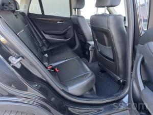 Black BMW X1 2014 in Riga, with an engine capacity of 2.00 L and mileage of 269 thousand km for 10700 €, photo 20 on AUTOMOTO.COM.LV