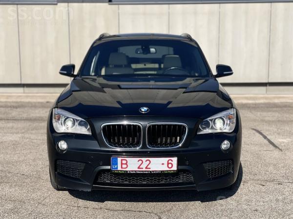Black BMW X1 2014 in Riga, with an engine capacity of 2.00 L and mileage of 199 thousand km for 11190 €, photo 2 on AUTOMOTO.COM.LV