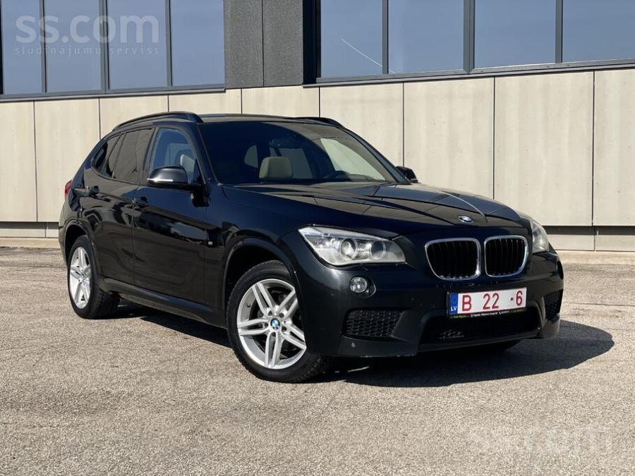 Black BMW X1 2014 in Riga, with an engine capacity of 2.00 L and mileage of 199 thousand km for 11190 €, photo 4 on AUTOMOTO.COM.LV
