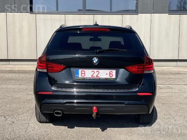 Black BMW X1 2014 in Riga, with an engine capacity of 2.00 L and mileage of 199 thousand km for 11190 €, photo 5 on AUTOMOTO.COM.LV