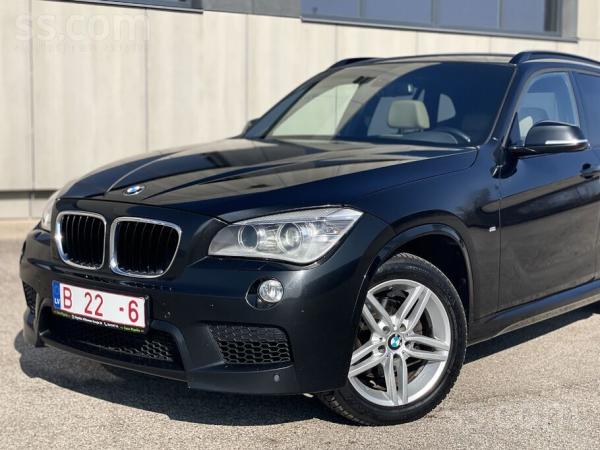 Black BMW X1 2014 in Riga, with an engine capacity of 2.00 L and mileage of 199 thousand km for 11190 €, photo 7 on AUTOMOTO.COM.LV