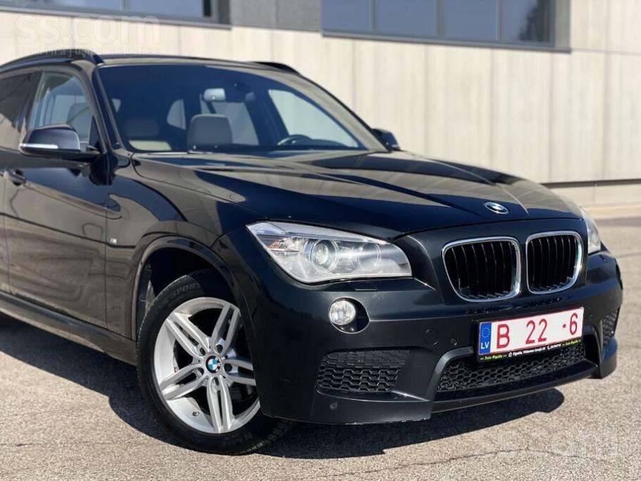 Black BMW X1 2014 in Riga, with an engine capacity of 2.00 L and mileage of 199 thousand km for 11190 €, photo 9 on AUTOMOTO.COM.LV
