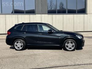 Black BMW X1 2014 in Riga, with an engine capacity of 2.00 L and mileage of 199 thousand km for 11190 €, photo 10 on AUTOMOTO.COM.LV