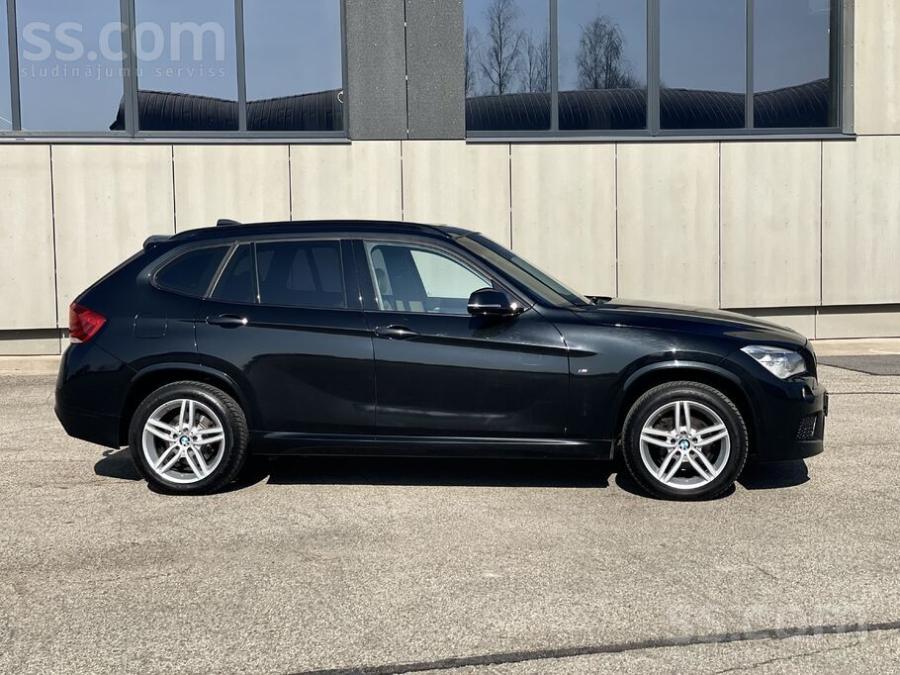 Black BMW X1 2014 in Riga, with an engine capacity of 2.00 L and mileage of 199 thousand km for 11190 €, photo 10 on AUTOMOTO.COM.LV