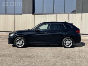 Black BMW X1 2014 in Riga, with an engine capacity of 2.00 L and mileage of 199 thousand km for 11190 €, photo 13 on AUTOMOTO.COM.LV