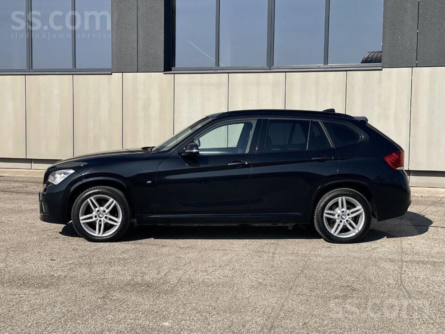 Black BMW X1 2014 in Riga, with an engine capacity of 2.00 L and mileage of 199 thousand km for 11190 €, photo 13 on AUTOMOTO.COM.LV