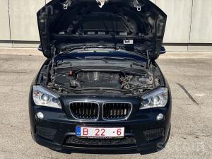 Black BMW X1 2014 in Riga, with an engine capacity of 2.00 L and mileage of 199 thousand km for 11190 €, photo 14 on AUTOMOTO.COM.LV