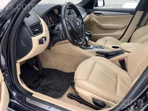 Black BMW X1 2014 in Riga, with an engine capacity of 2.00 L and mileage of 199 thousand km for 11190 €, photo 17 on AUTOMOTO.COM.LV