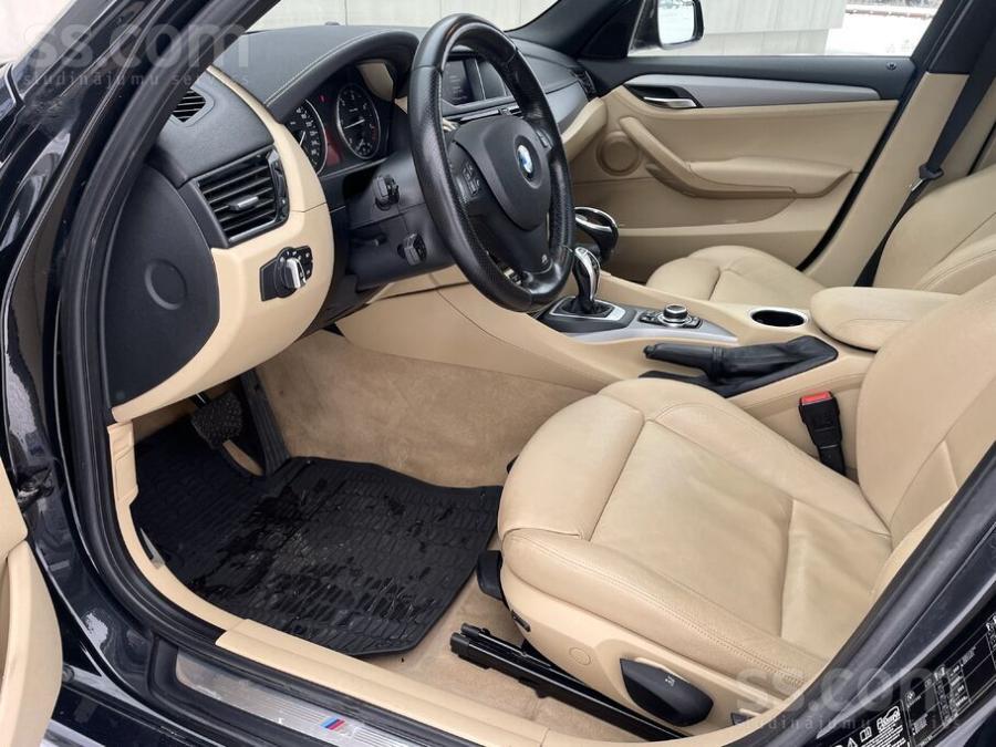 Black BMW X1 2014 in Riga, with an engine capacity of 2.00 L and mileage of 199 thousand km for 11190 €, photo 17 on AUTOMOTO.COM.LV
