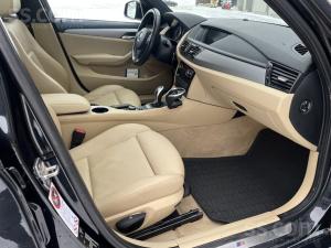 Black BMW X1 2014 in Riga, with an engine capacity of 2.00 L and mileage of 199 thousand km for 11190 €, photo 19 on AUTOMOTO.COM.LV