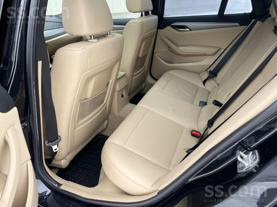 Black BMW X1 2014 in Riga, with an engine capacity of 2.00 L and mileage of 199 thousand km for 11190 €, photo 22 on AUTOMOTO.COM.LV