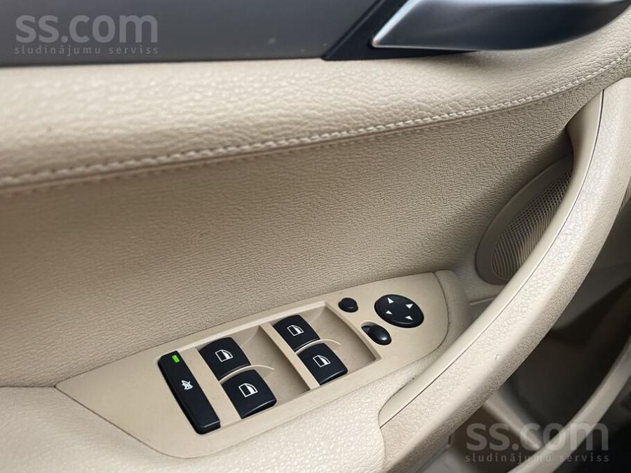 Black BMW X1 2014 in Riga, with an engine capacity of 2.00 L and mileage of 199 thousand km for 11190 €, photo 23 on AUTOMOTO.COM.LV