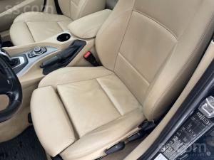 Black BMW X1 2014 in Riga, with an engine capacity of 2.00 L and mileage of 199 thousand km for 11190 €, photo 24 on AUTOMOTO.COM.LV