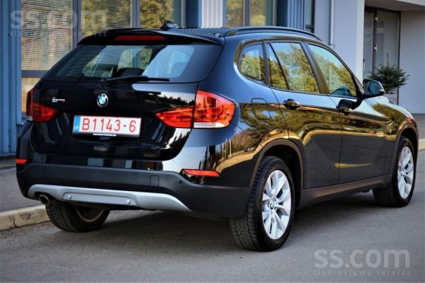 Black BMW X1 2014 in Riga, with an engine capacity of 2.00 L and mileage of 203 thousand km for 10300 €, photo 7 on AUTOMOTO.COM.LV