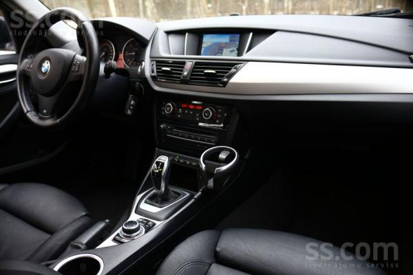 Black BMW X1 2014 in Riga, with an engine capacity of 2.00 L and mileage of 203 thousand km for 10300 €, photo 8 on AUTOMOTO.COM.LV
