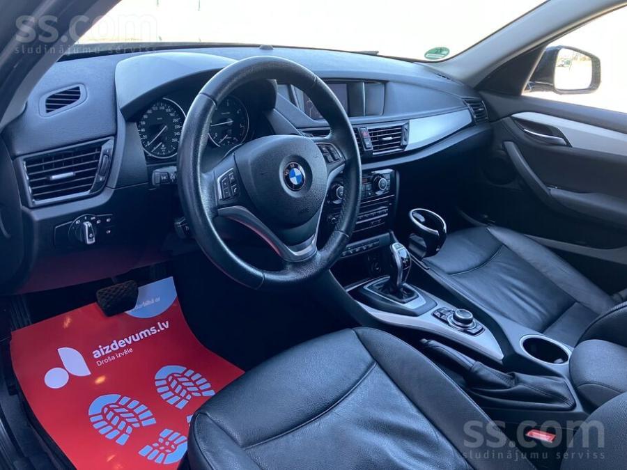 Black BMW X1 2014 in Talsi, with an engine capacity of 2.00 L and mileage of 181 thousand km for 11500 €, photo 19 on AUTOMOTO.COM.LV