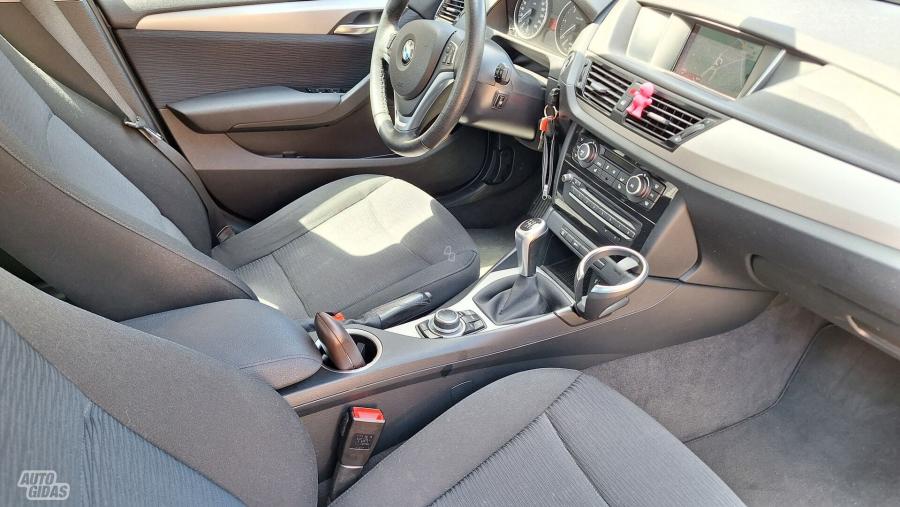 Black BMW X1 2014 in Marijampole, with an engine capacity of 2.00 L and mileage of 227 thousand km for 6900 €, photo 23 on AUTOMOTO.COM.LV