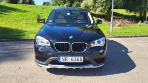 Black BMW X1 2014 in Riga, with an engine capacity of 2.00 L and mileage of 214 thousand km for 9300 €, photo 4 on AUTOMOTO.COM.LV