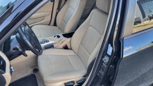Black BMW X1 2014 in Riga, with an engine capacity of 2.00 L and mileage of 214 thousand km for 9300 €, photo 9 on AUTOMOTO.COM.LV