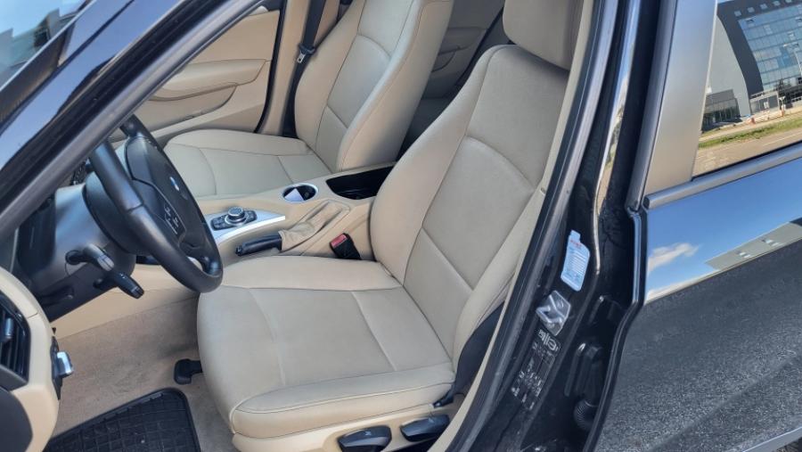 Black BMW X1 2014 in Riga, with an engine capacity of 2.00 L and mileage of 214 thousand km for 9300 €, photo 9 on AUTOMOTO.COM.LV