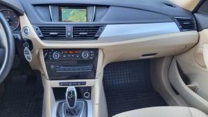 Black BMW X1 2014 in Riga, with an engine capacity of 2.00 L and mileage of 214 thousand km for 9300 €, photo 11 on AUTOMOTO.COM.LV