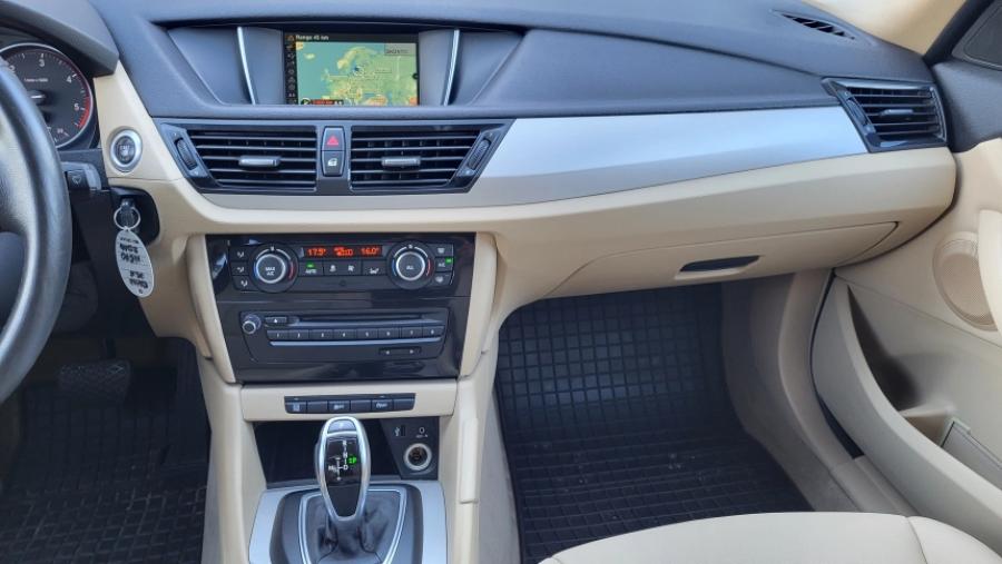 Black BMW X1 2014 in Riga, with an engine capacity of 2.00 L and mileage of 214 thousand km for 9300 €, photo 11 on AUTOMOTO.COM.LV