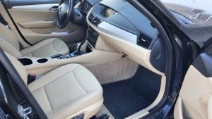 Black BMW X1 2014 in Riga, with an engine capacity of 2.00 L and mileage of 214 thousand km for 9300 €, photo 14 on AUTOMOTO.COM.LV