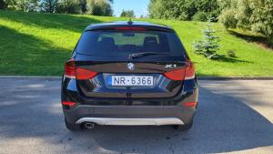 Black BMW X1 2014 in Riga, with an engine capacity of 2.00 L and mileage of 214 thousand km for 9300 €, photo 16 on AUTOMOTO.COM.LV