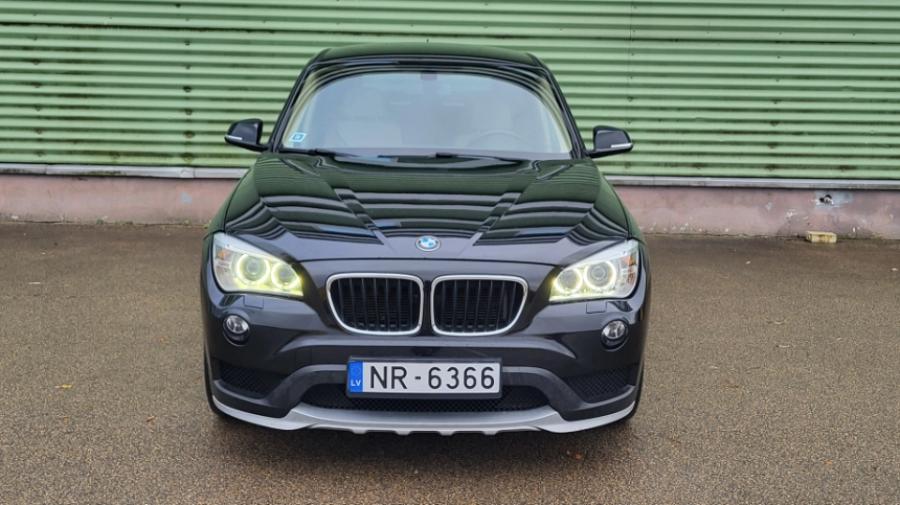 Black BMW X1 2014 in Riga, with an engine capacity of 2.00 L and mileage of 214 thousand km for 9300 €, photo 19 on AUTOMOTO.COM.LV