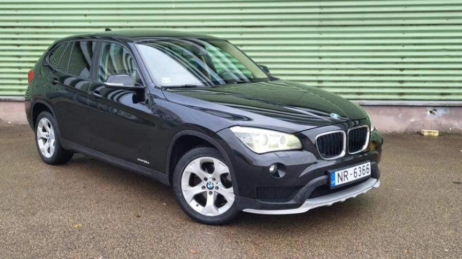 Black BMW X1 2014 in Riga, with an engine capacity of 2.00 L and mileage of 214 thousand km for 9300 €, photo 21 on AUTOMOTO.COM.LV