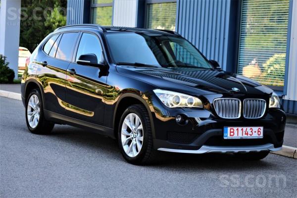 Black BMW X1 2014 in Riga, with an engine capacity of 2.00 L and mileage of 203 thousand km for 10300 €, photo 5 on AUTOMOTO.COM.LV