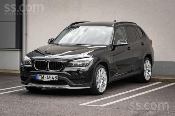 Black BMW X1 2014 in Riga, with an engine capacity of 2.00 L and mileage of 257 thousand km for 9900 €, photo 1 on AUTOMOTO.COM.LV