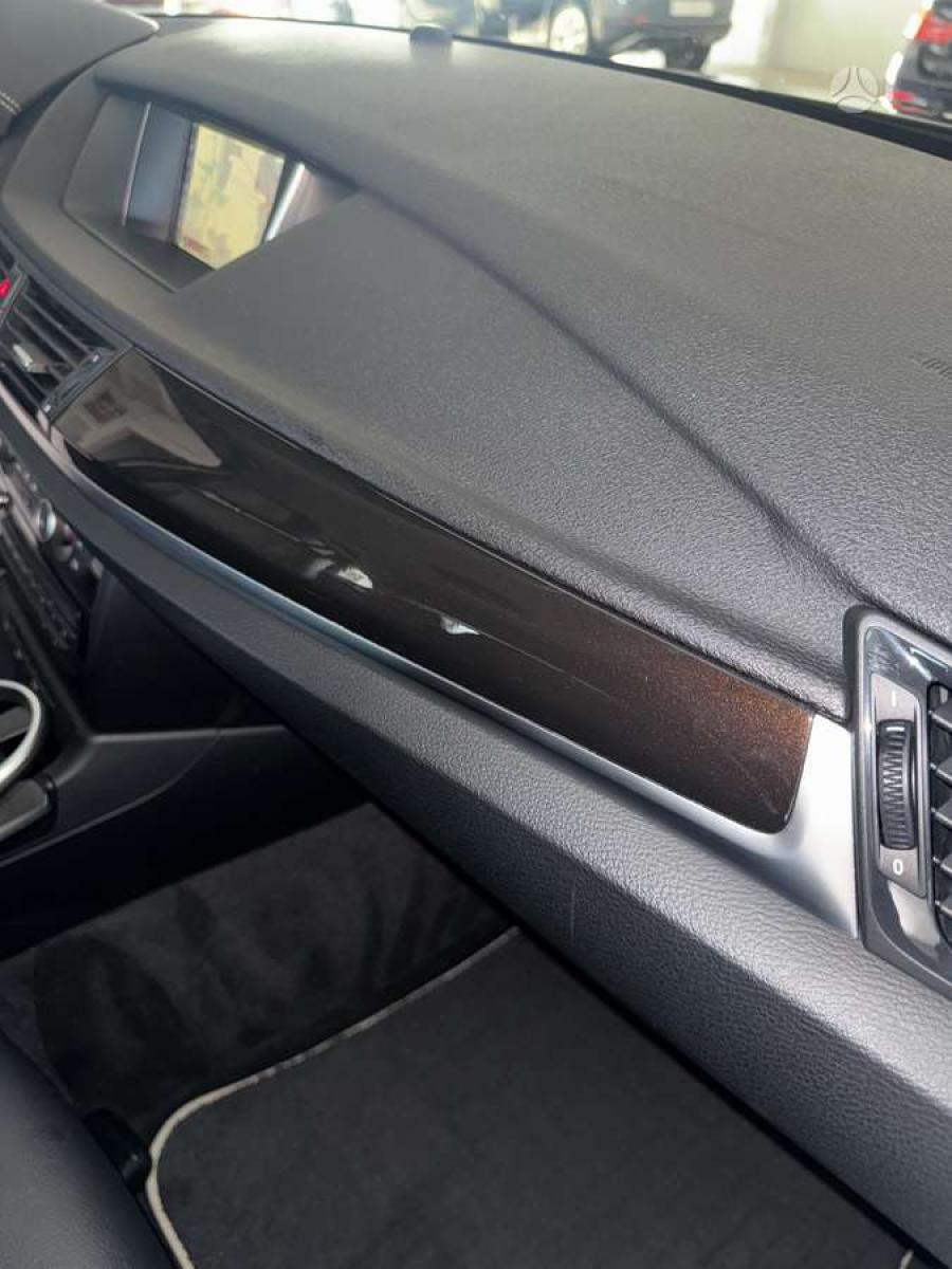 Black BMW X1 2014 in Kaunas, with an engine capacity of 2.00 L and mileage of 240 thousand km for 6999 €, photo 5 on AUTOMOTO.COM.LV