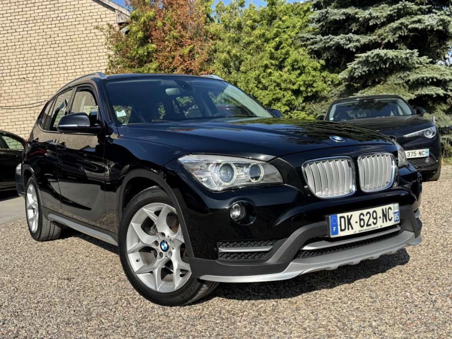 Black BMW X1 2014 in Kaunas, with an engine capacity of 2.00 L and mileage of 240 thousand km for 6999 €, photo 6 on AUTOMOTO.COM.LV