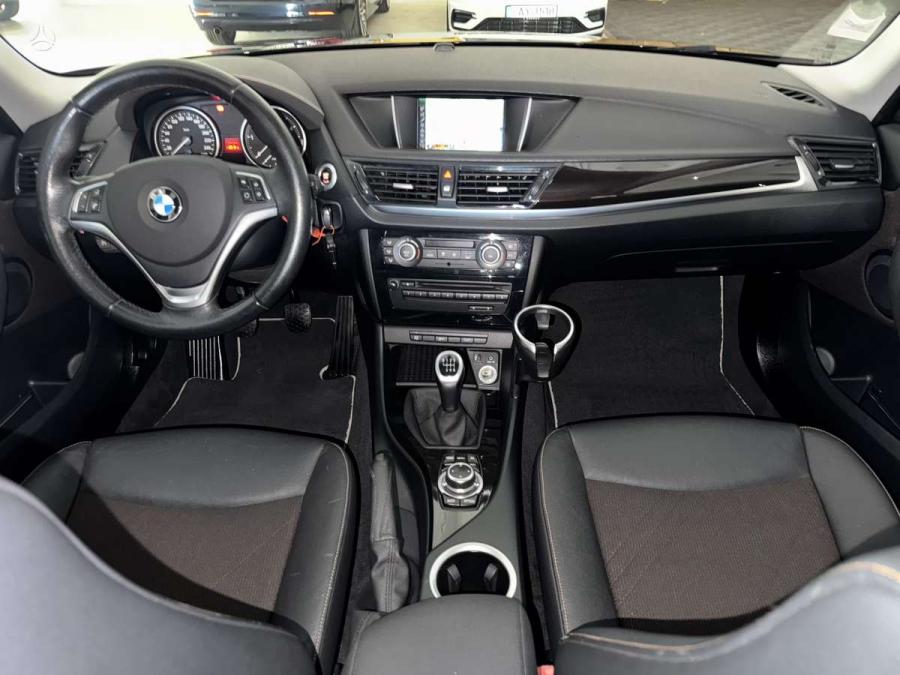 Black BMW X1 2014 in Kaunas, with an engine capacity of 2.00 L and mileage of 240 thousand km for 6999 €, photo 8 on AUTOMOTO.COM.LV