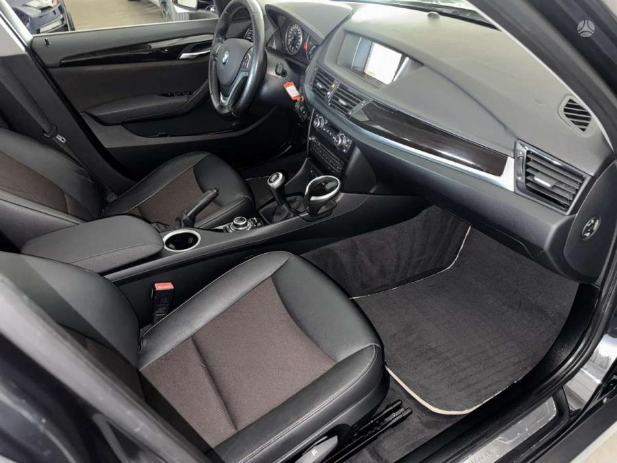Black BMW X1 2014 in Kaunas, with an engine capacity of 2.00 L and mileage of 240 thousand km for 6999 €, photo 9 on AUTOMOTO.COM.LV