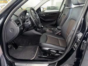 Black BMW X1 2014 in Kaunas, with an engine capacity of 2.00 L and mileage of 240 thousand km for 6999 €, photo 12 on AUTOMOTO.COM.LV