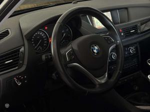 Black BMW X1 2014 in Kaunas, with an engine capacity of 2.00 L and mileage of 240 thousand km for 6999 €, photo 14 on AUTOMOTO.COM.LV