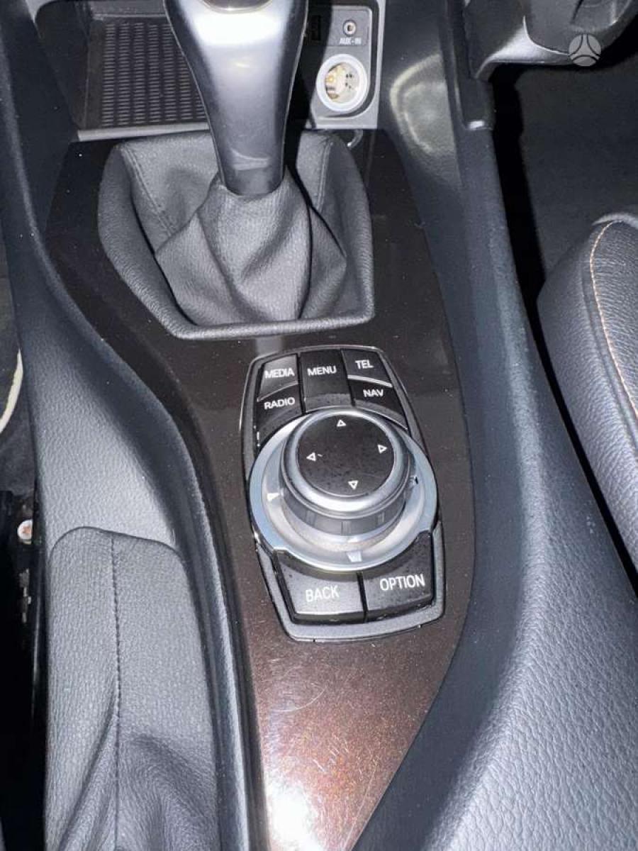 Black BMW X1 2014 in Kaunas, with an engine capacity of 2.00 L and mileage of 240 thousand km for 6999 €, photo 15 on AUTOMOTO.COM.LV