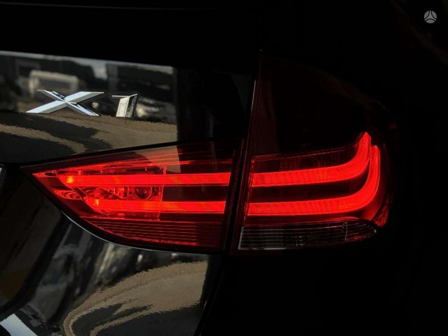 Black BMW X1 2014 in Kaunas, with an engine capacity of 2.00 L and mileage of 240 thousand km for 6999 €, photo 20 on AUTOMOTO.COM.LV